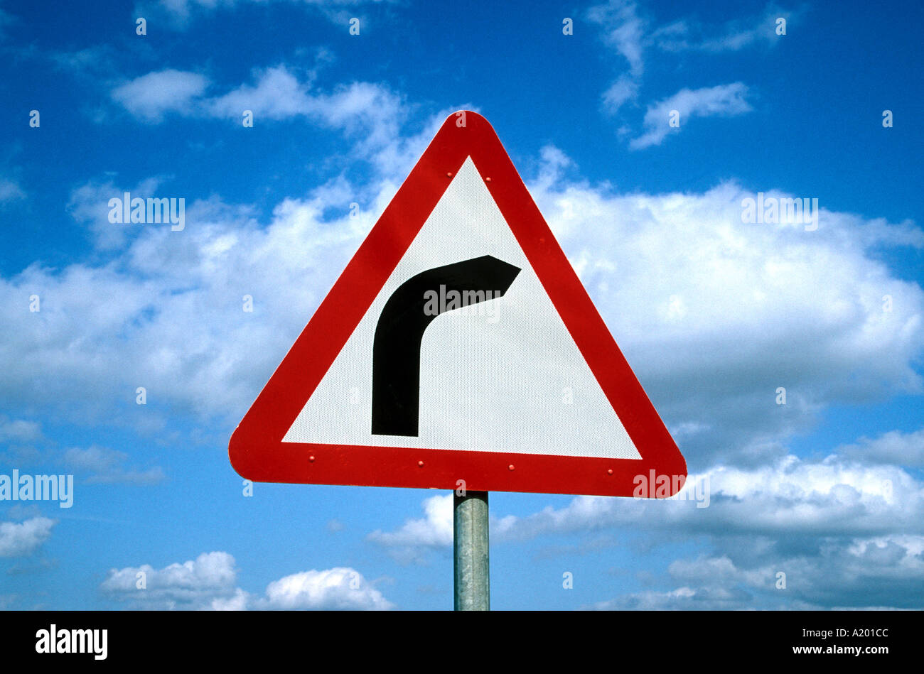 Road sign warning right bend England Stock Photo - Alamy