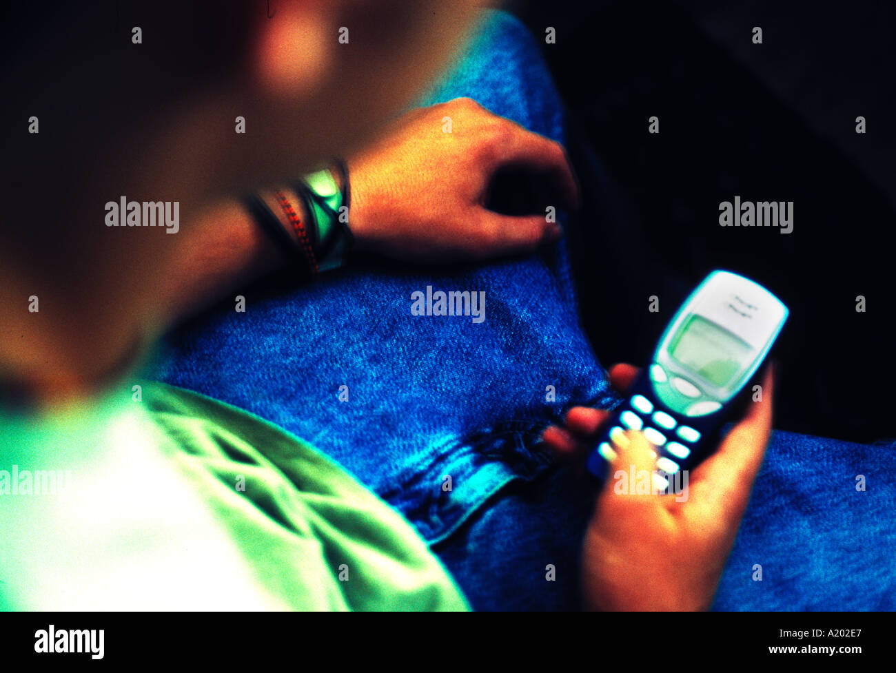 Teenager sending text message Stock Photo - Alamy