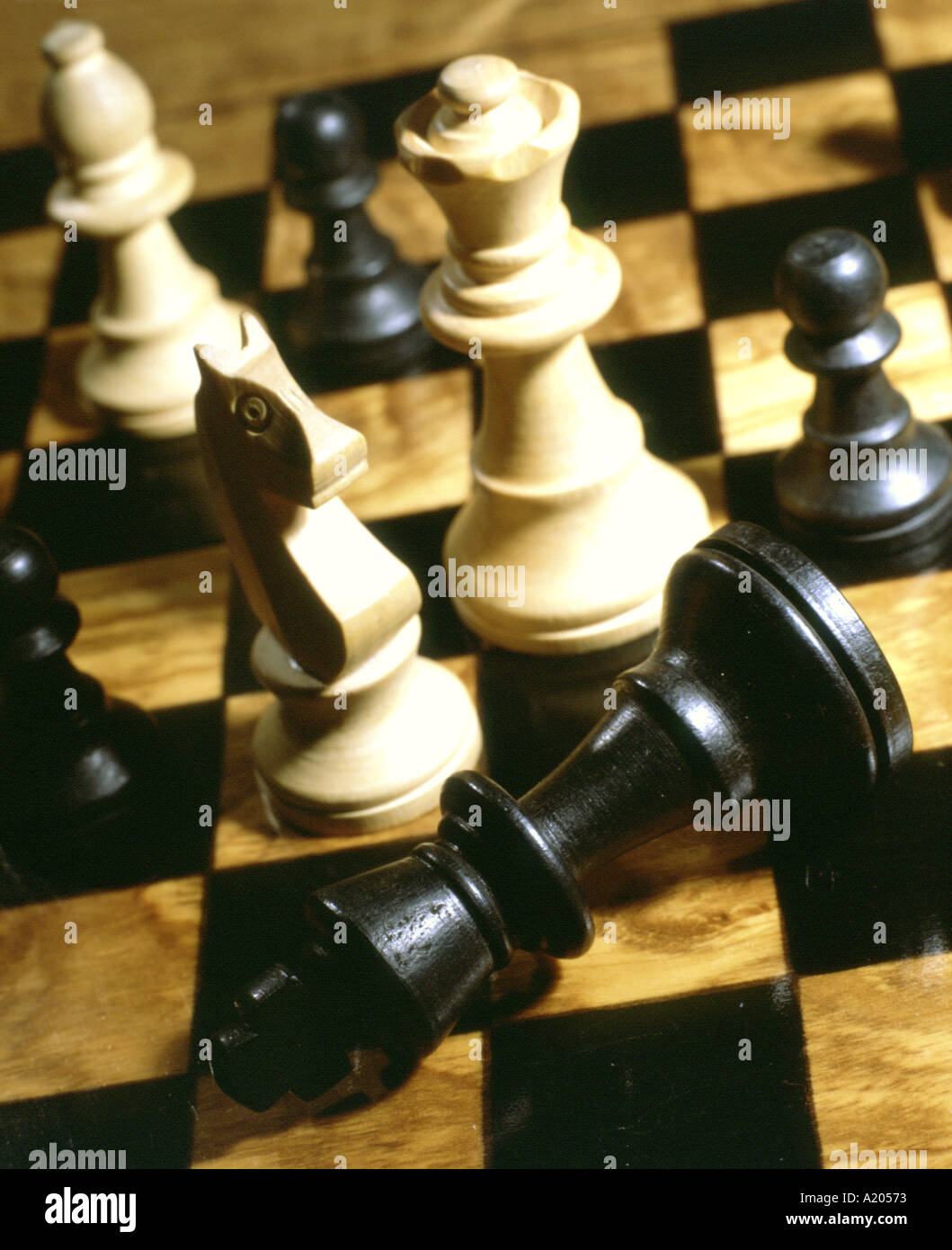 The end of a chess game, with the white queen victorious Stock Photo ...