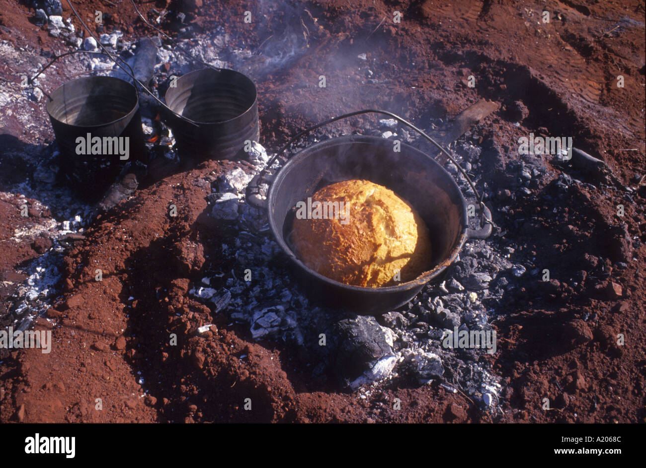 Cooking damper bread outback australia hi-res stock photography and ...