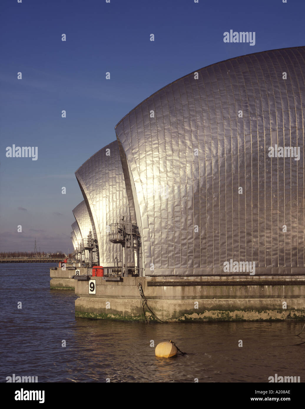 Thames Barrier Row of Piers with buoy Stock Photo - Alamy