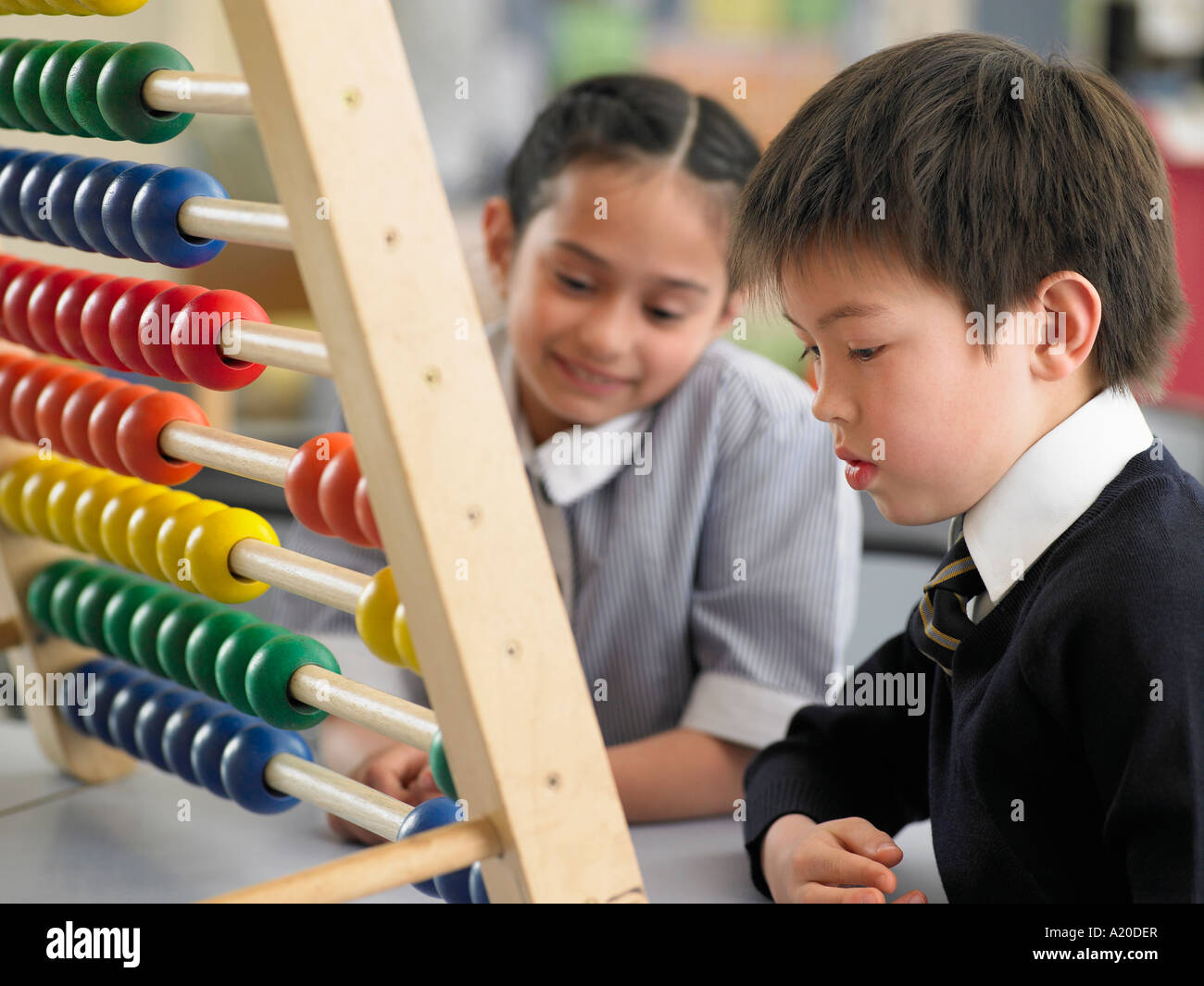 Student using abacus in hi-res stock photography and images - Alamy
