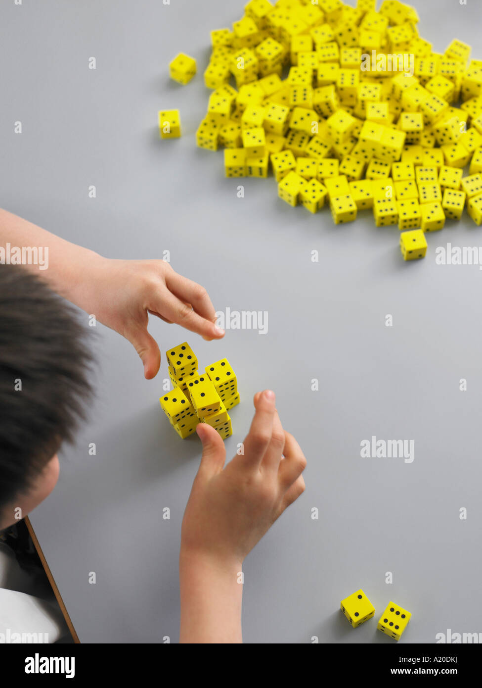 Boy Playing With Dice High Resolution Stock Photography and Images - Alamy