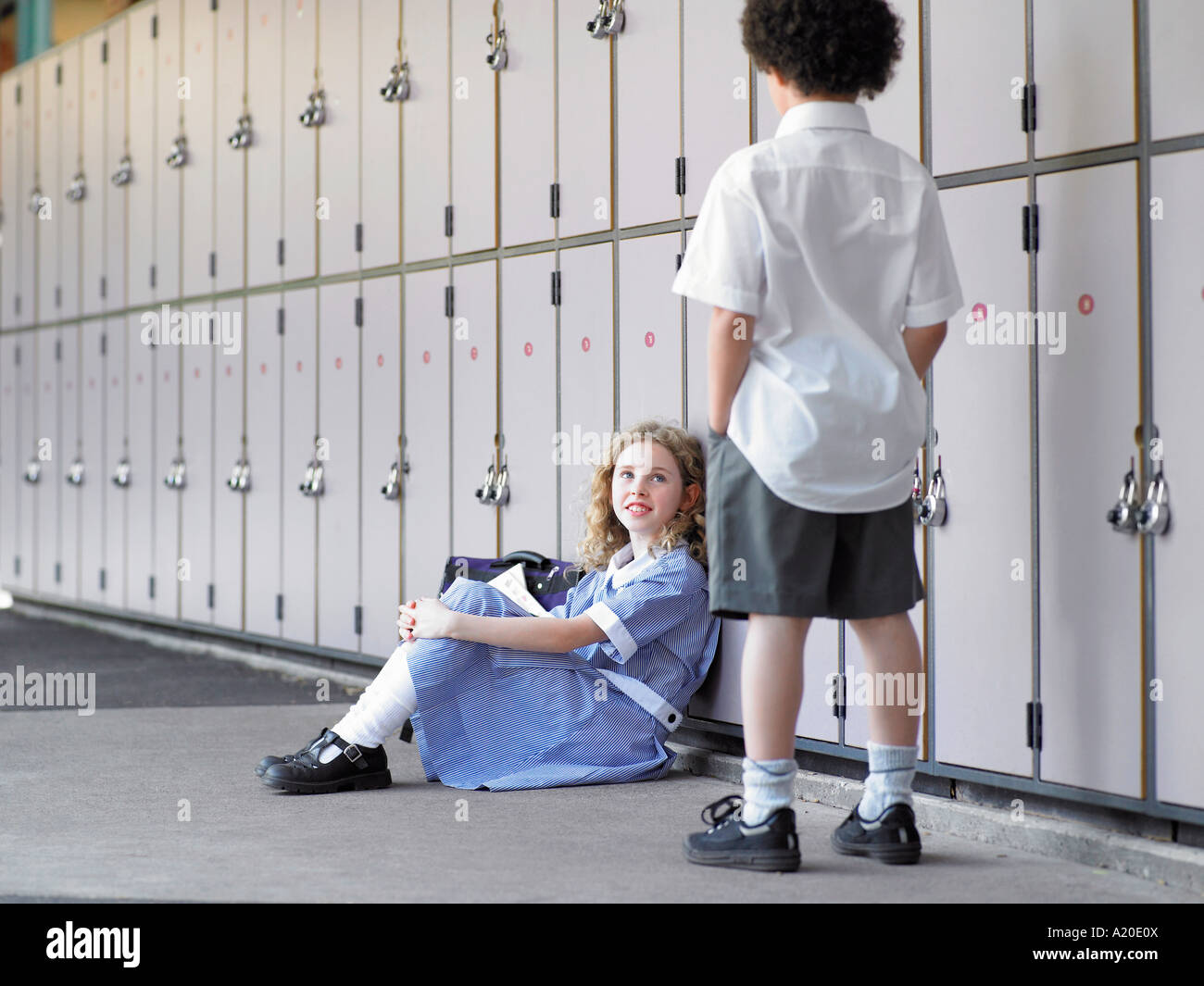 Child waiting in corridor school hi-res stock photography and images ...