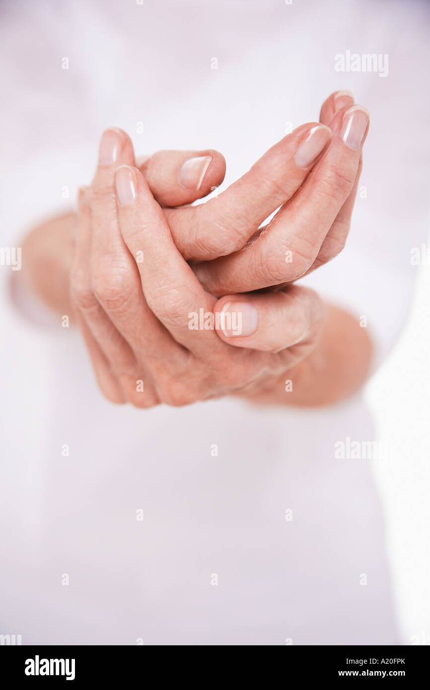 Woman Cupping Her Hands, mid section Stock Photo - Alamy