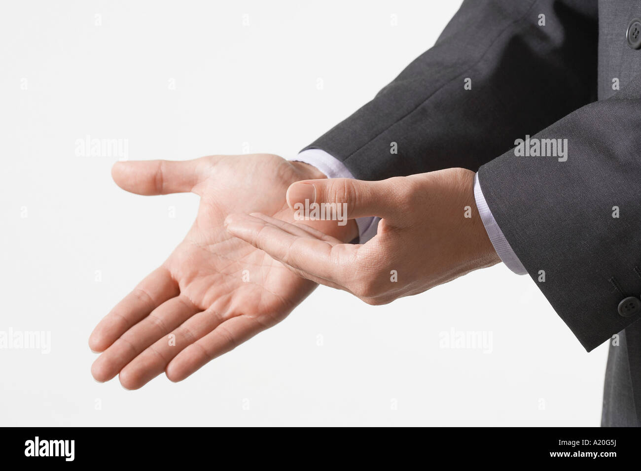 Businessman Making Hand Gestures, close up of hands Stock Photo - Alamy