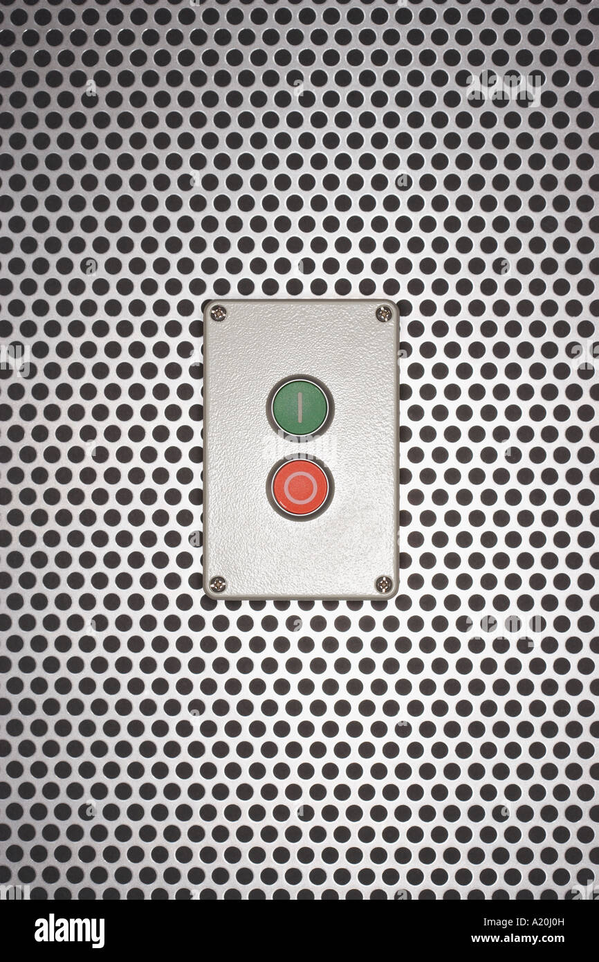Red and green buttons on silver background Stock Photo - Alamy