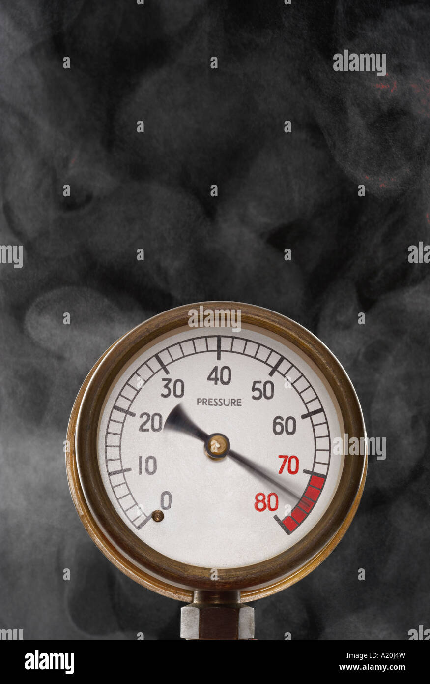 Pressure gauge at maximum omitting smoke in studio Stock Photo - Alamy