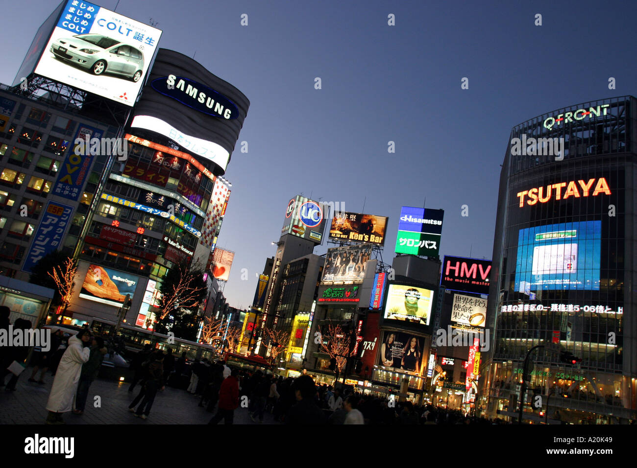 The shopping and entertainment area of Shibuya crossing lit up at night ...