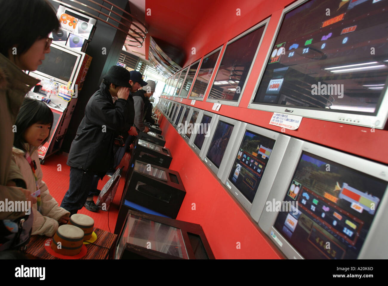 Customers outside a store in Akihabara electric town using computer ...