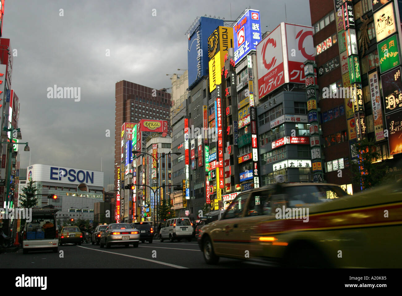 Advertising boards and neon signs adorn the buildings in Kabukicho area ...