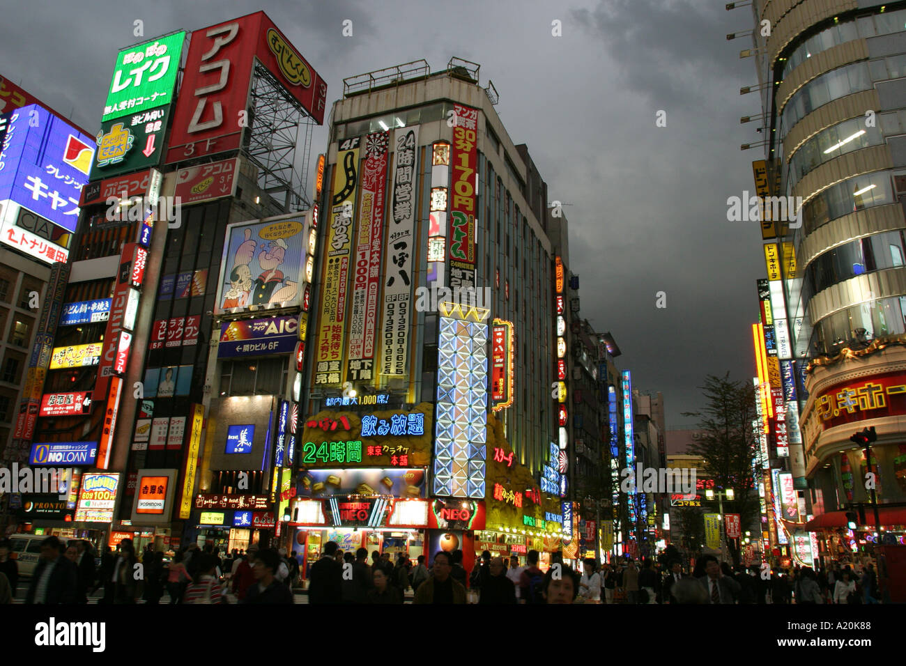 Advertising boards and neon signs adorn the buildings in Kabukicho area ...