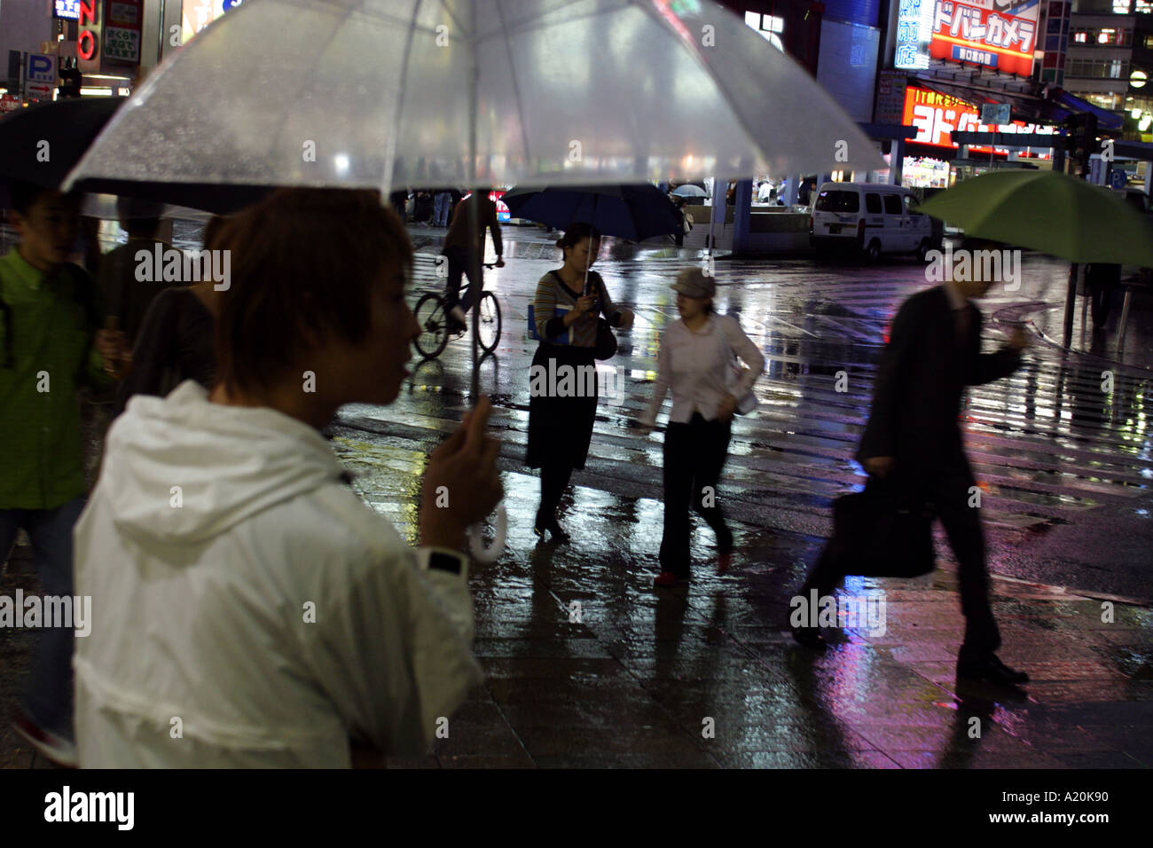 Pedestrians in the rain, Shinjuku, Tokyo, Japan Stock Photo - Alamy