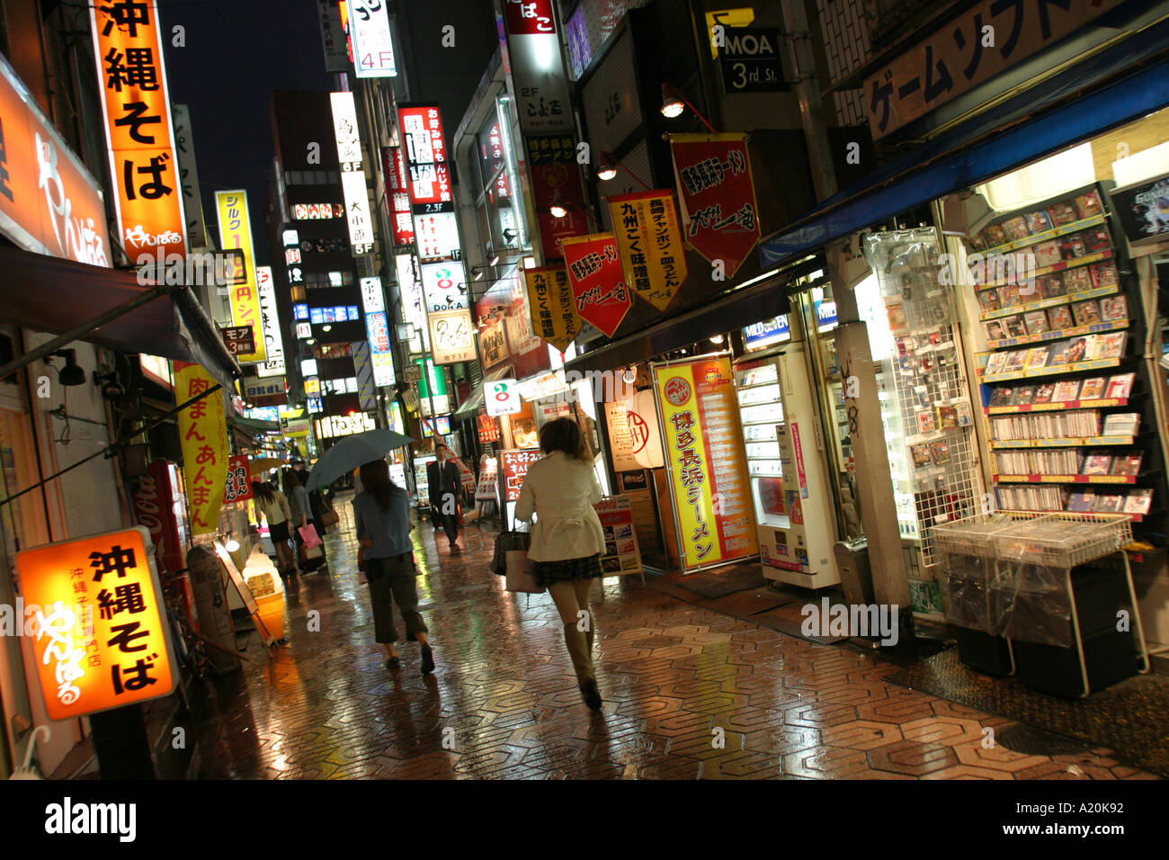 Advertising boards and neon signs adorning the buildings in Shinjuku ...