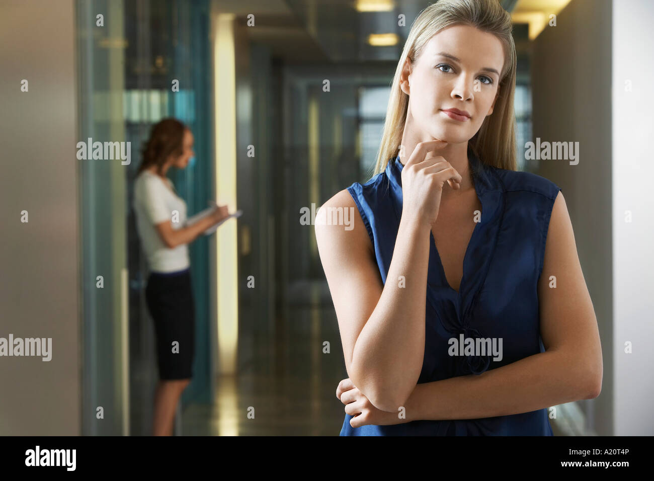 Attractive aloof young woman hi-res stock photography and images - Alamy
