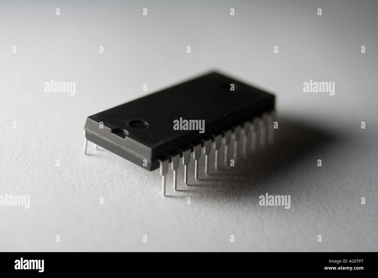 a single computer chip standing all alone Stock Photo - Alamy