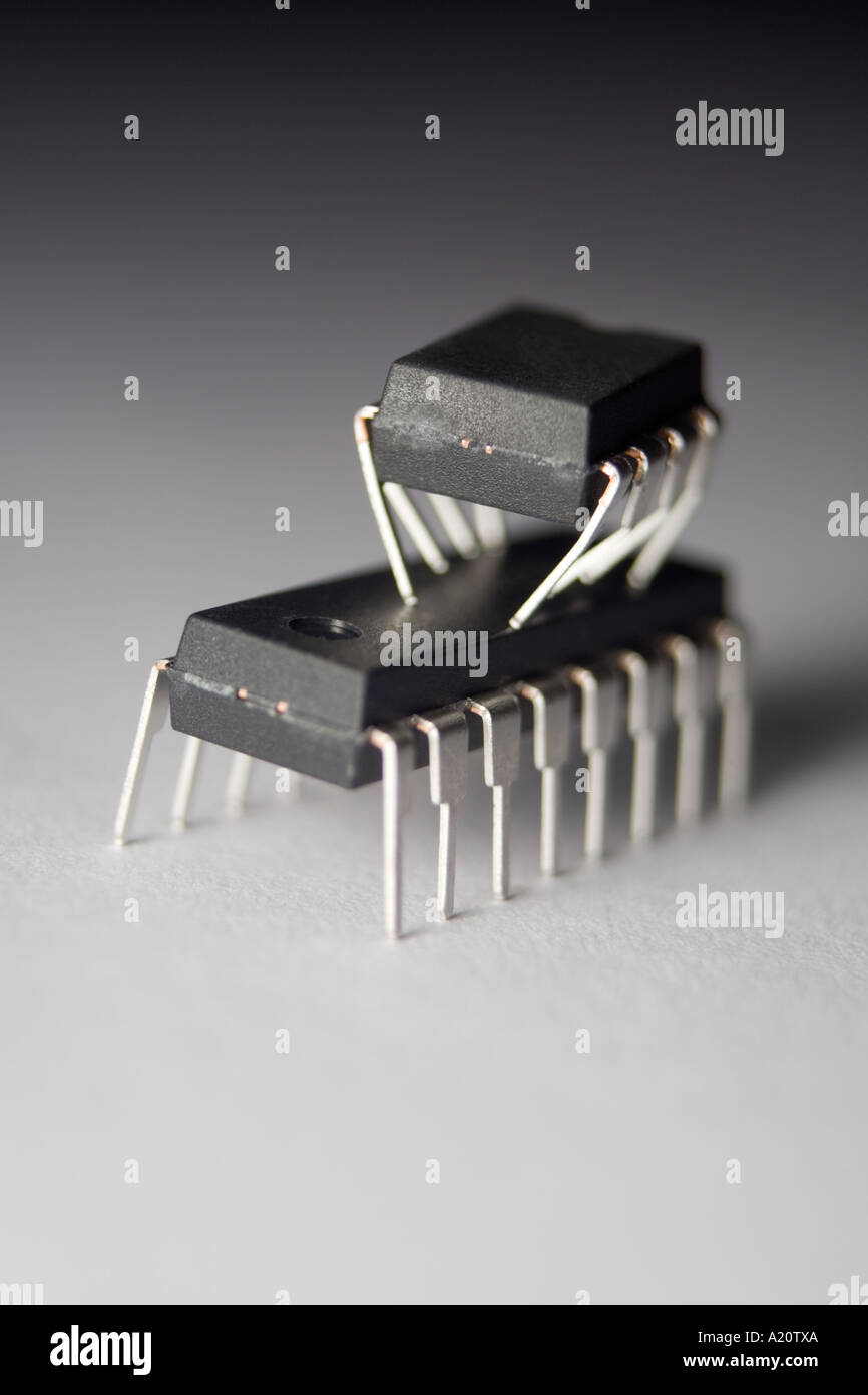 computer chips standing on another Stock Photo - Alamy
