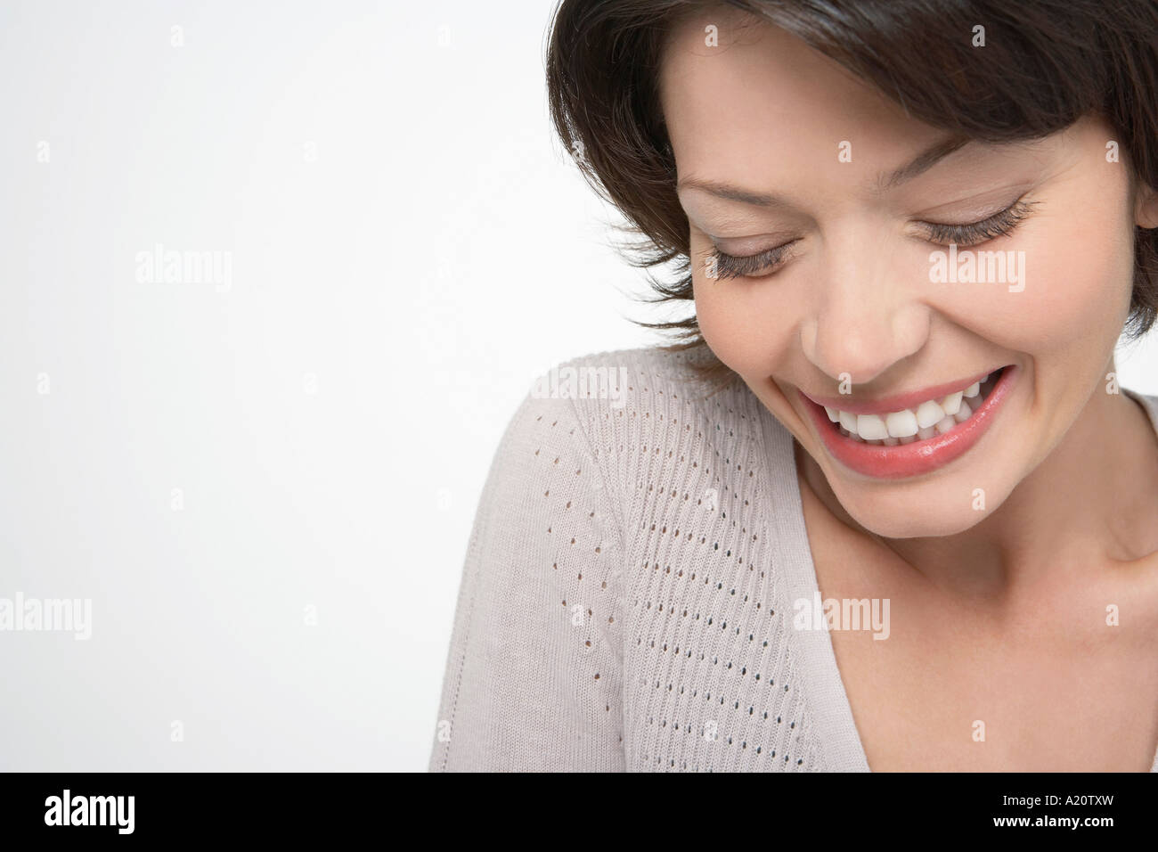 Woman with large smile, eyes closed, close-up Stock Photo - Alamy