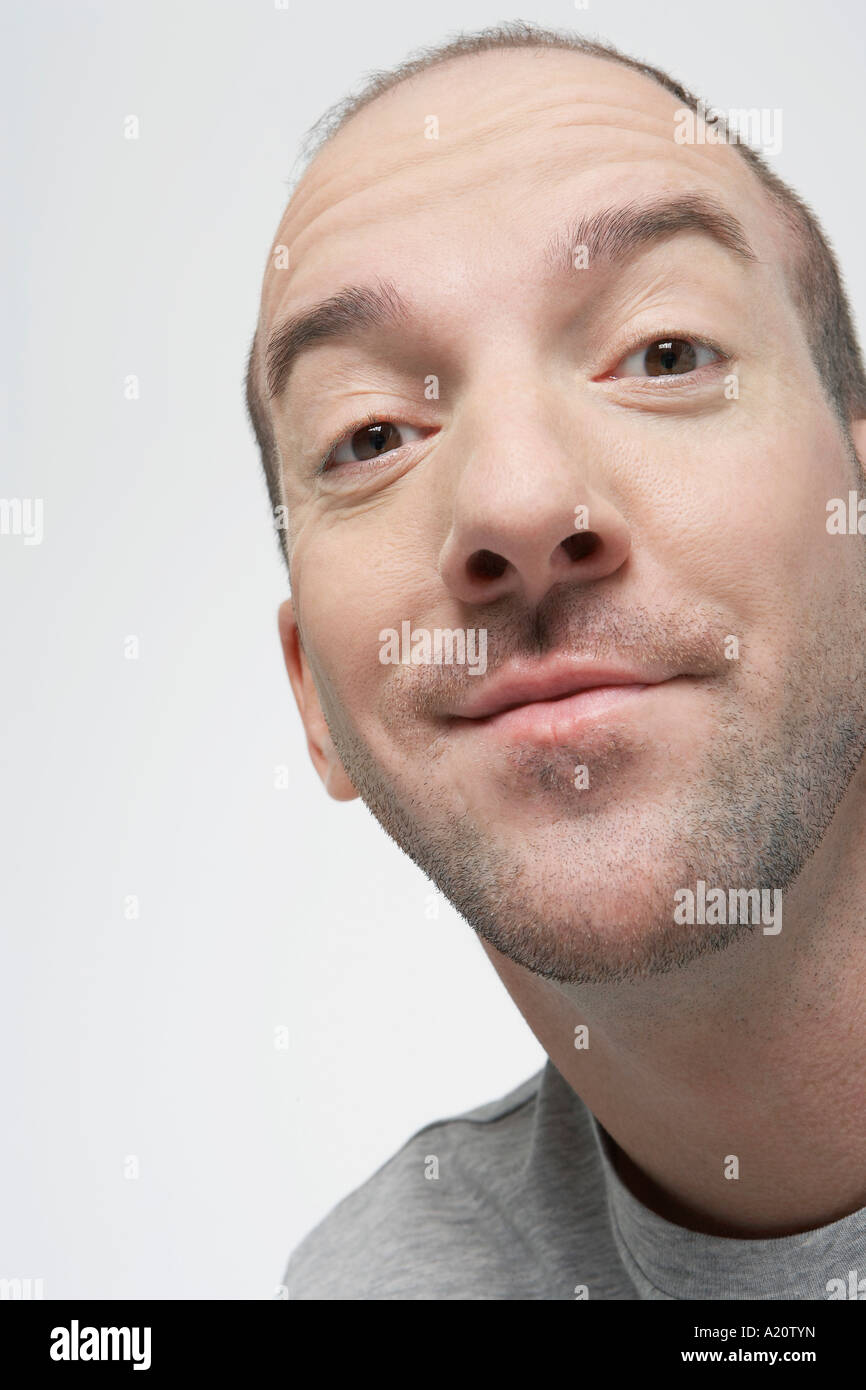 Satisfied-looking man, close-up Stock Photo - Alamy