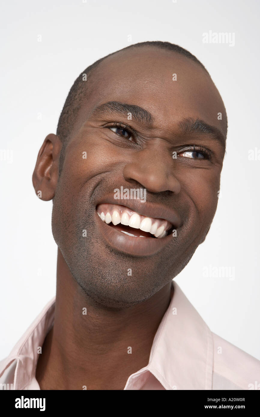 Smiling Man with squinty eyes, close-up Stock Photo - Alamy