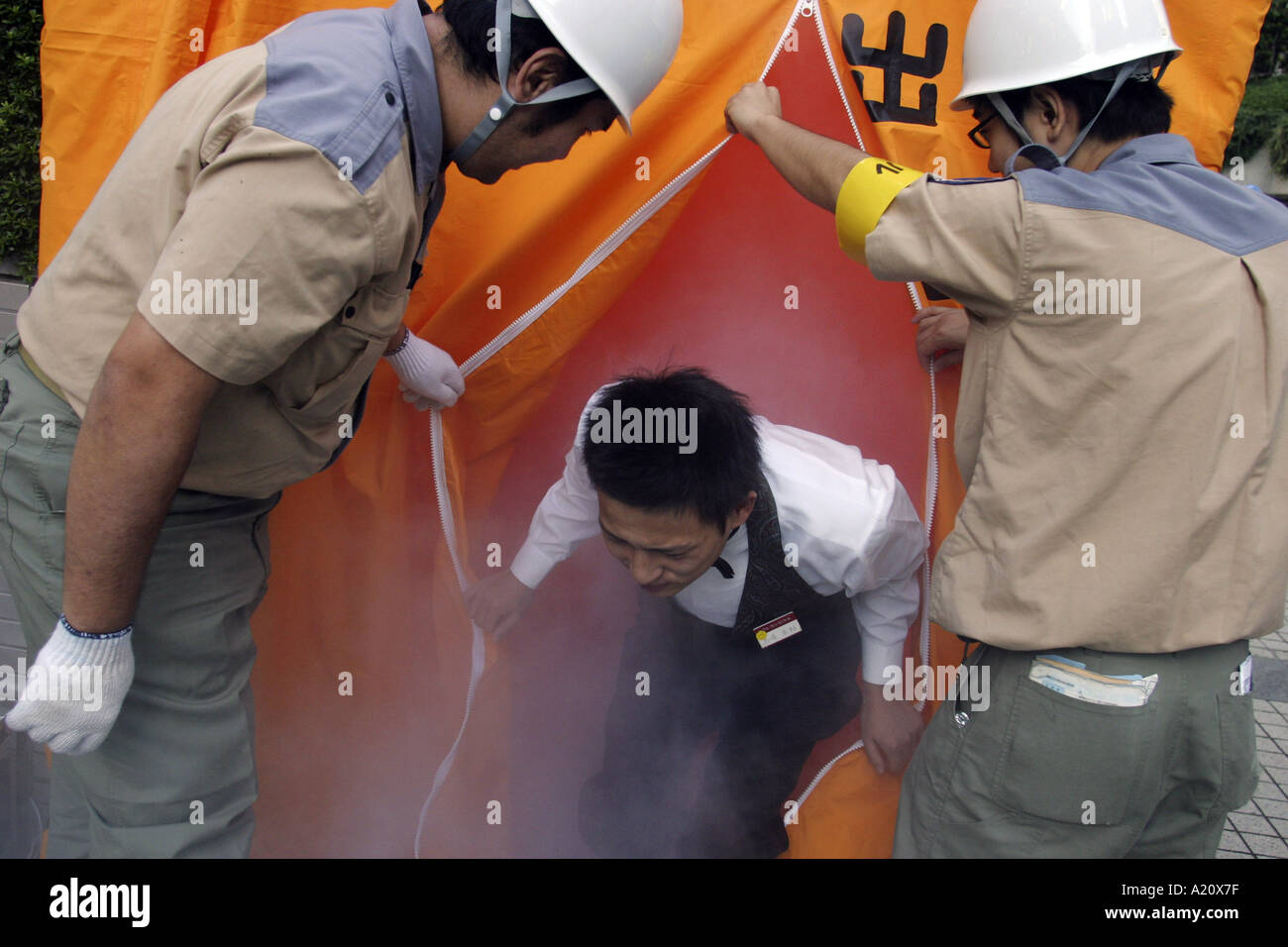 Emergency training for office employees, Tokyo, Japan Stock Photo - Alamy