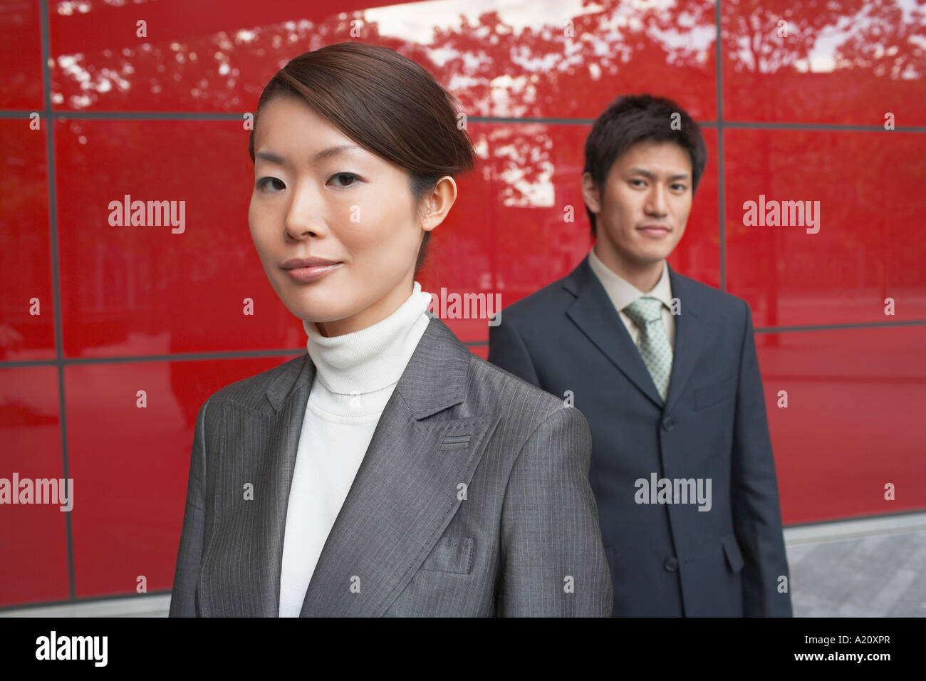 Two businesspeople standing outside hi-res stock photography and images ...