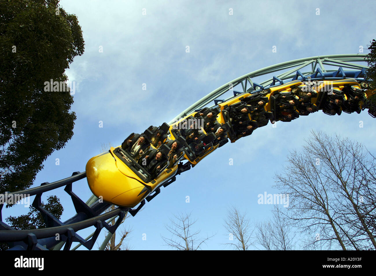 Children riding a rollercoaster in the Toshimaen amusement and funfair ...