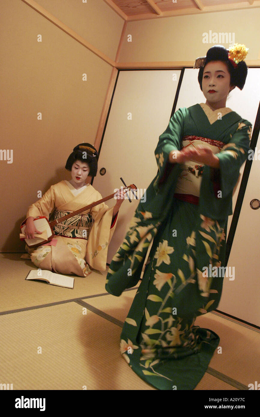 Geisha and maiko girl sing and dance for clients, Kyoto, Japan Stock ...
