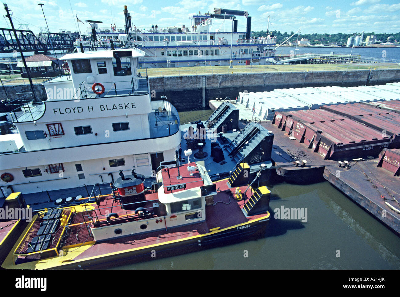 tugboat pushing barge through lock number 15 Mississippi River near ...