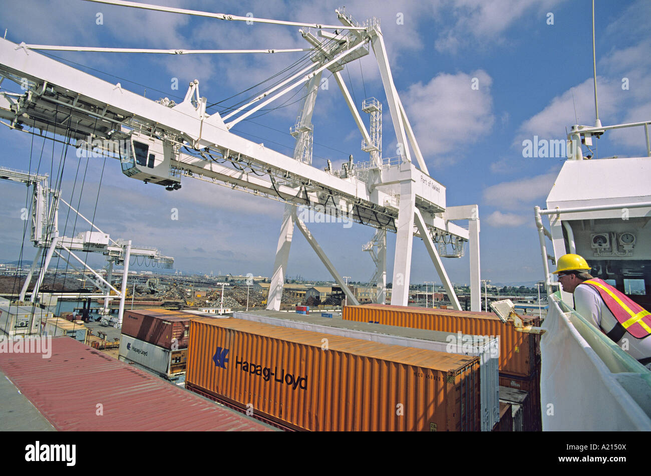 model released man supervises loading on container ship Oakland ...