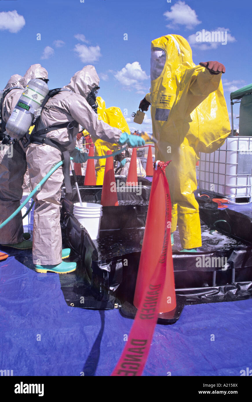 Hazmat decontaminating people hi-res stock photography and images - Alamy