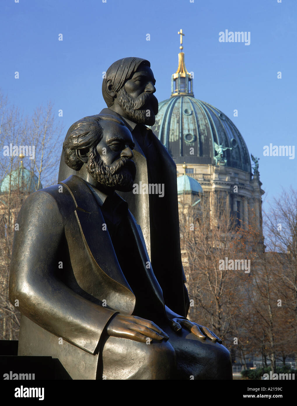 The statues of Marx and Engels with the dome of the Berlin Cathedral ...