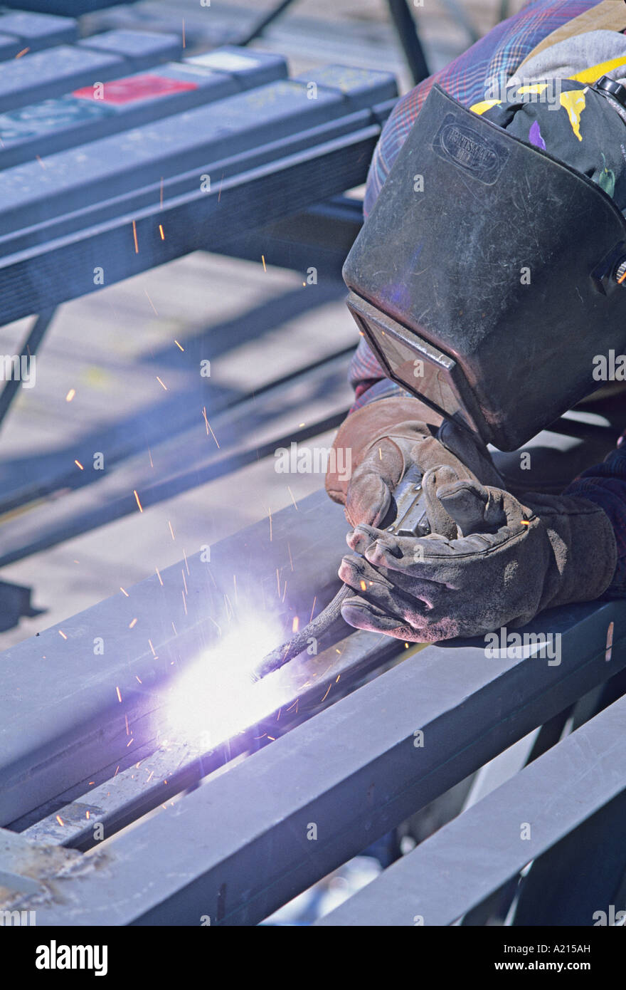 welder welding steel roof sections together Stock Photo - Alamy
