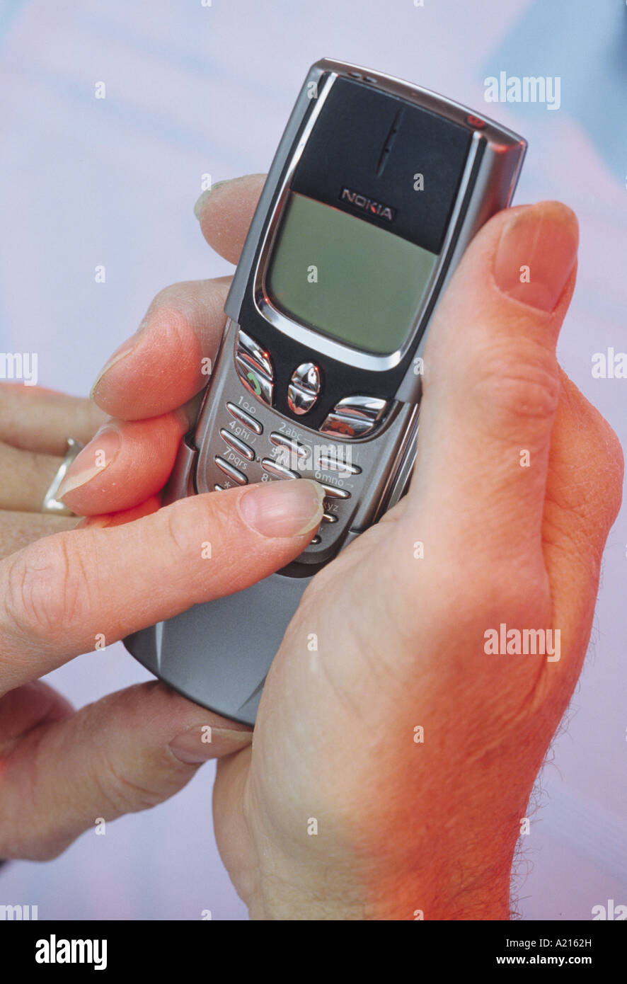 woman hand dialing cell phone Stock Photo - Alamy