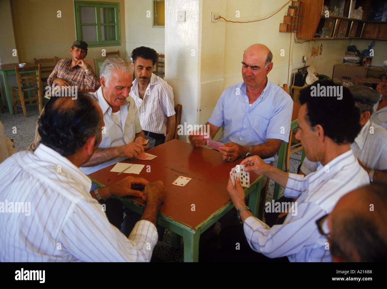 Old Men Playing Cards At Table High Resolution Stock Photography and ...