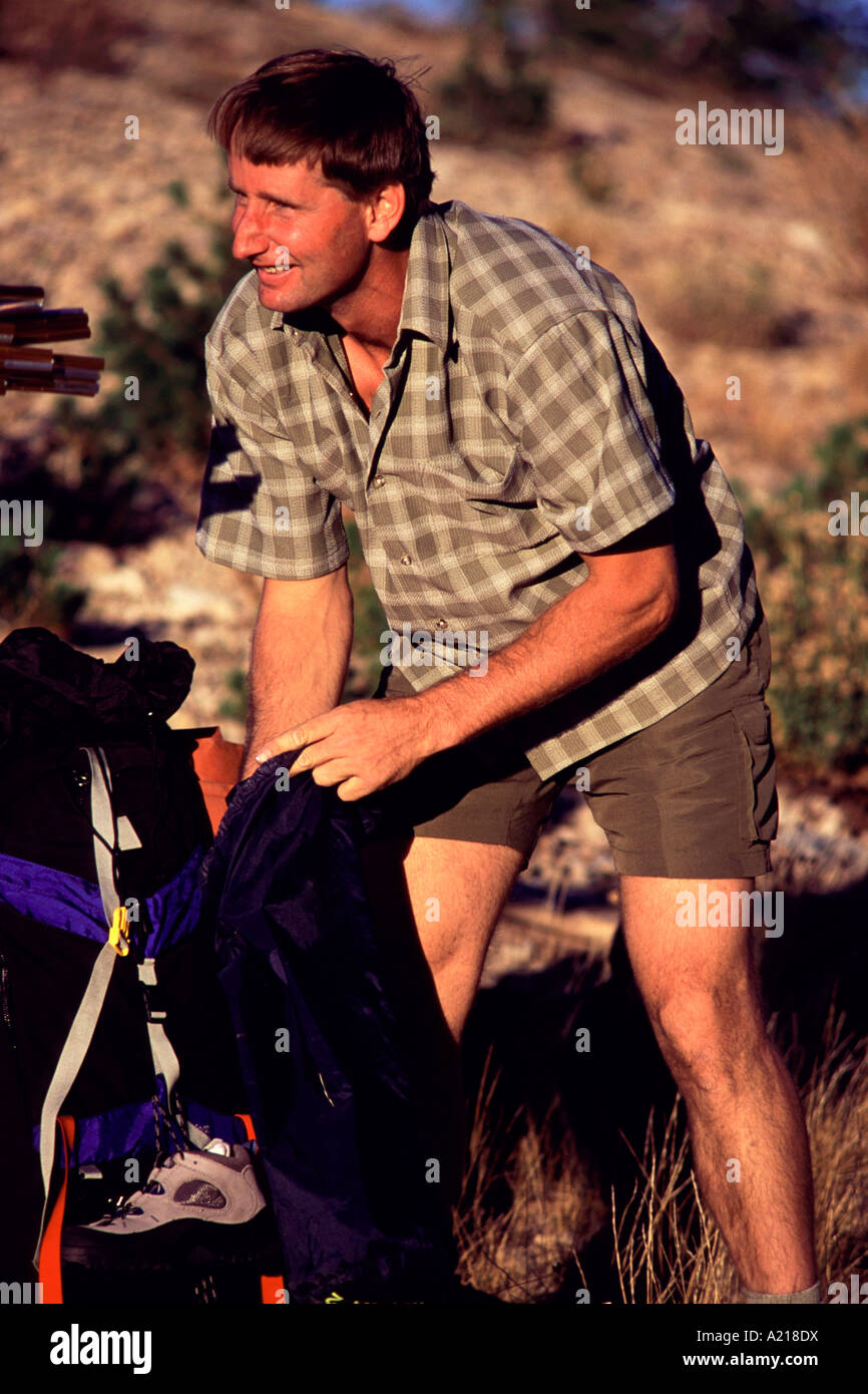A man loading a backpack near Truckee CA Stock Photo - Alamy
