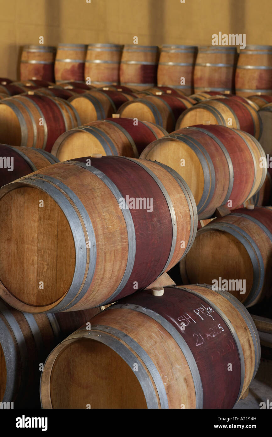 Wine casks in order, standing and lying down Stock Photo - Alamy