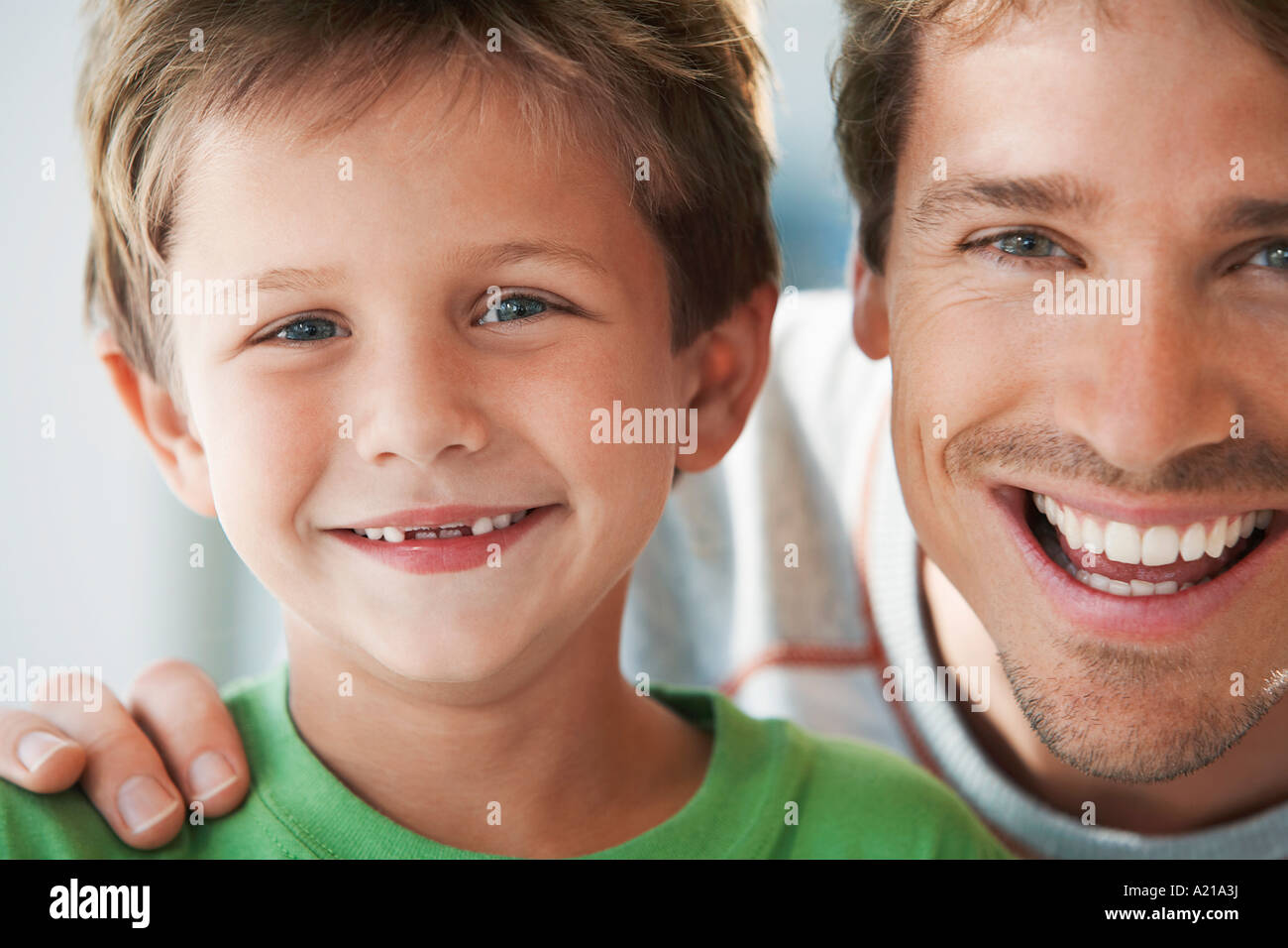 Father and Son smiling, head and shoulders, portrait Stock Photo - Alamy