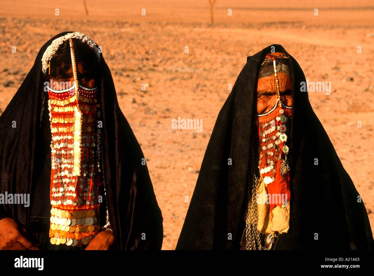 Two women wearing traditional veils Egypt Africa O Palkovitch Stock ...