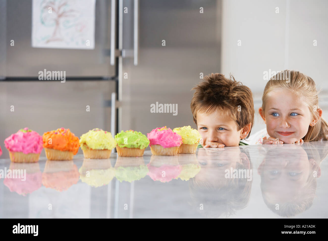Boy peeking over counter hi-res stock photography and images - Alamy