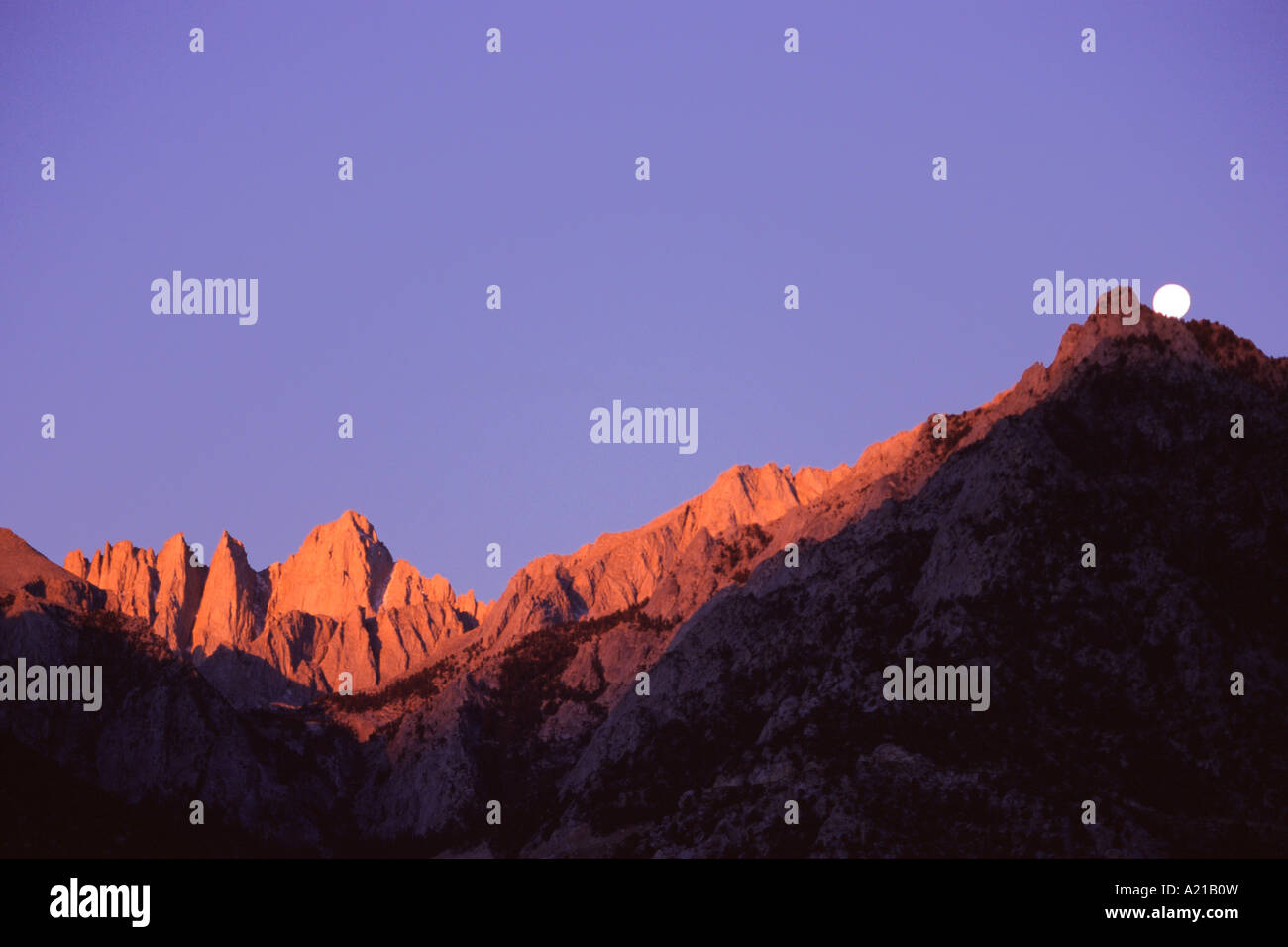 Mount Whitney and moon at sunrise in the Sierra mountains in California ...