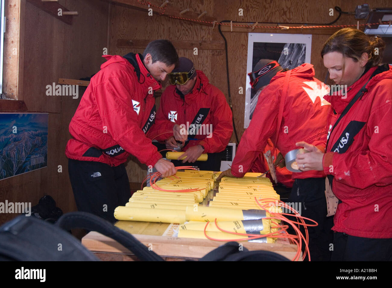 Ski patrollers preparing explosives for avalanche control at Squaw ...