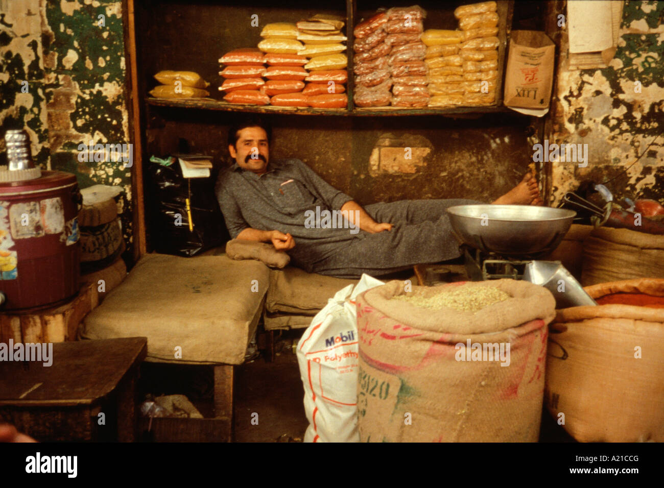 A shop owner in his store in Rawalpindi pakistan Stock Photo - Alamy