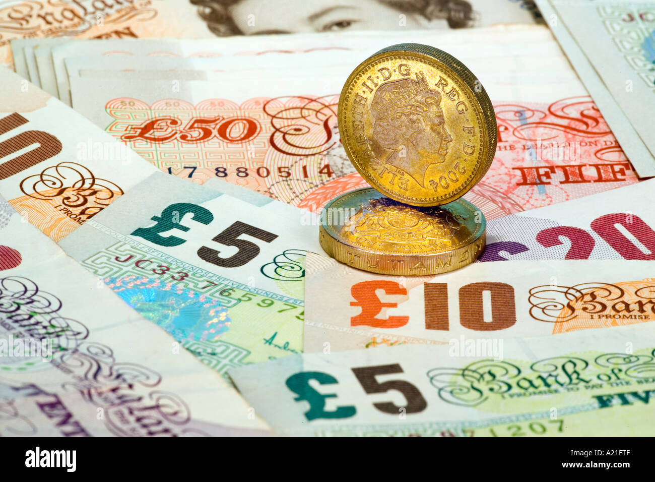 British Bank Notes and one pound coins Stock Photo - Alamy