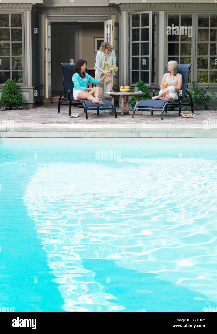 House pool rich woman hi-res stock photography and images - Alamy