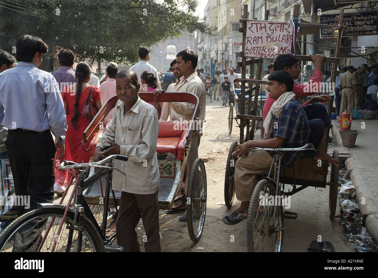 Rickshaw drivers on the crowded streets of Chandni Chowk in Delhi India ...