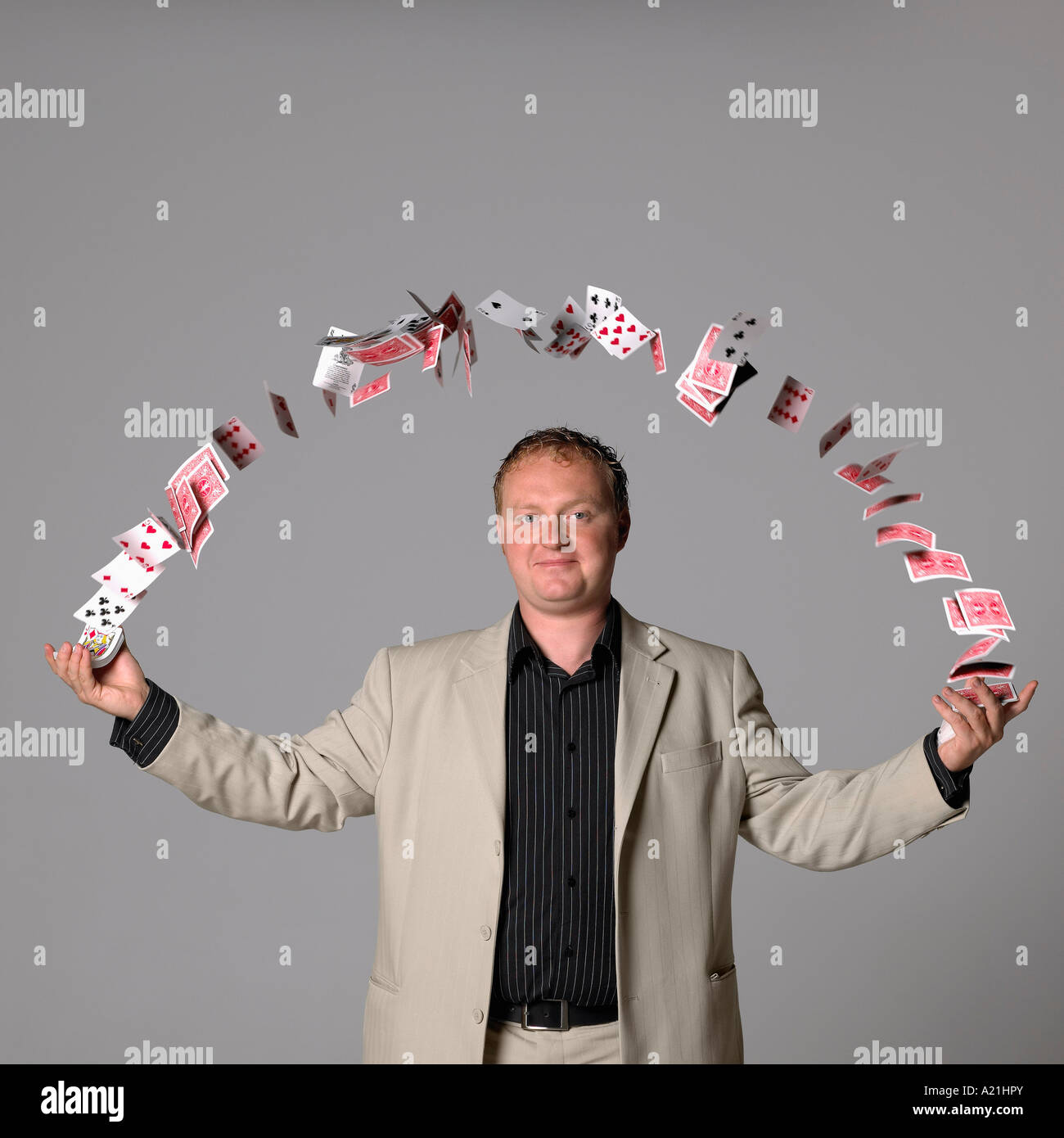 Man Juggling Playing Cards Stock Photo - Alamy