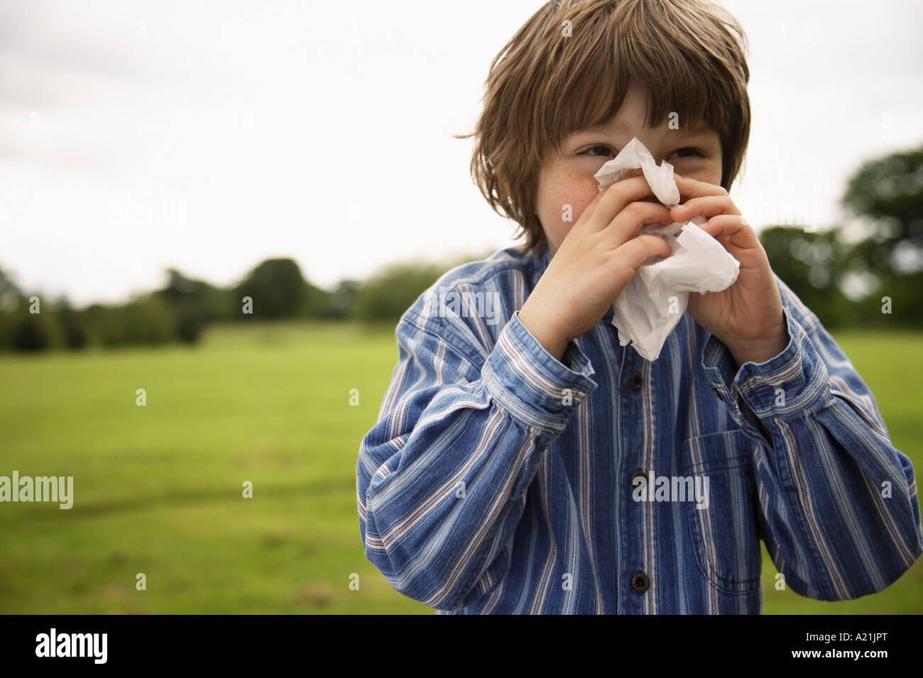 Boy Holding His Nose High Resolution Stock Photography and Images - Alamy