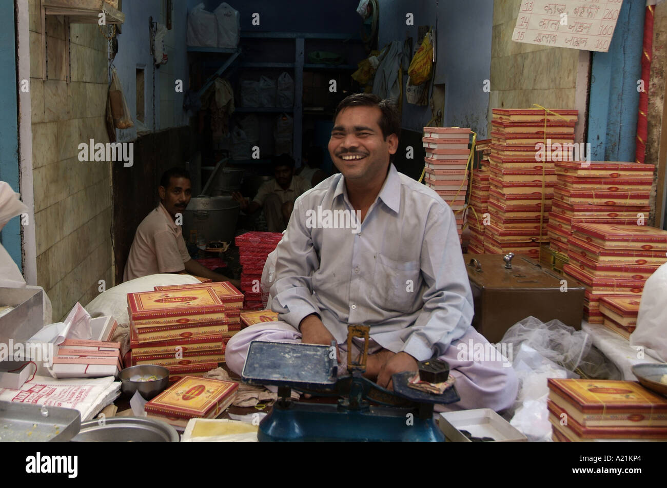 Street vendor selling sweets and chocolates in the Chandni Chowk area ...