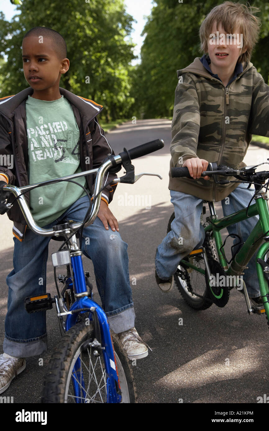 Children playing in street on bike hi-res stock photography and images ...